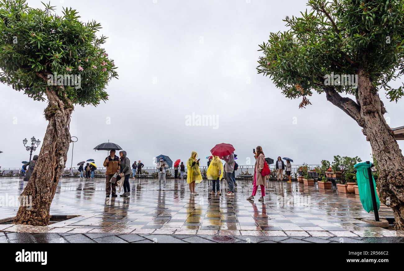 People using Umbrellas In Taormina Sicily Italy Stock Photo - Alamy