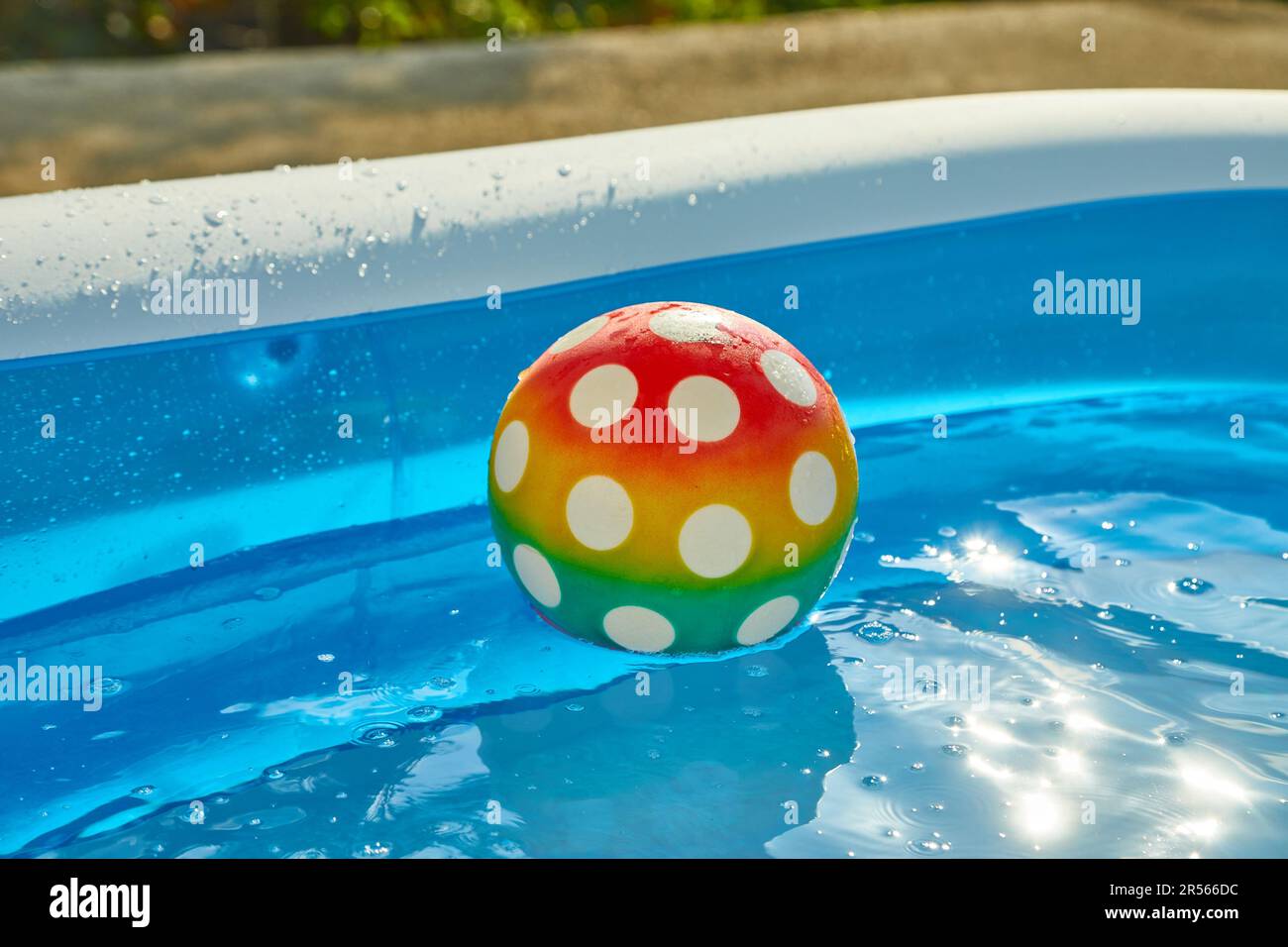 Ball in the water of a pool Stock Photo - Alamy