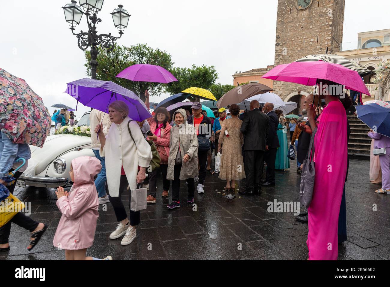 People using Umbrellas In Taormina Sicily Italy Stock Photo - Alamy