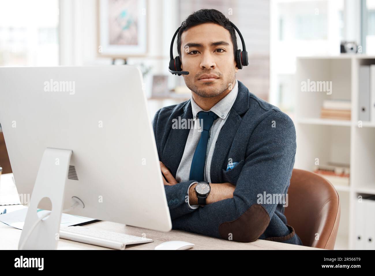 Business man, call center and serious face with telemarketing and phone ...