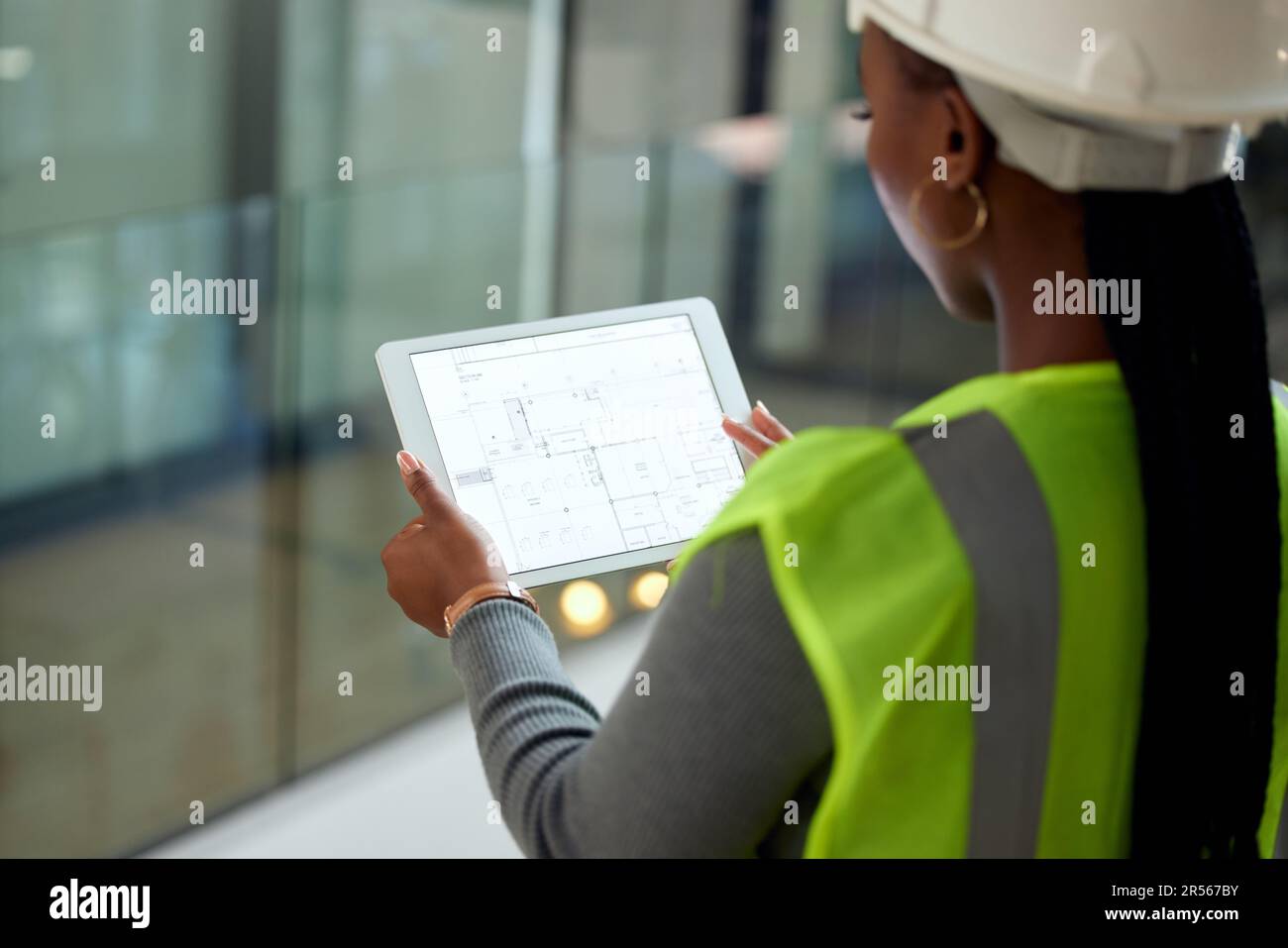 Woman engineer, tablet and architect floor plan on engineering app with ...