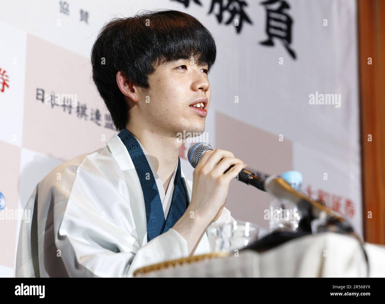 Shogi player Sota Fujii attends a press conference after clinching the ...