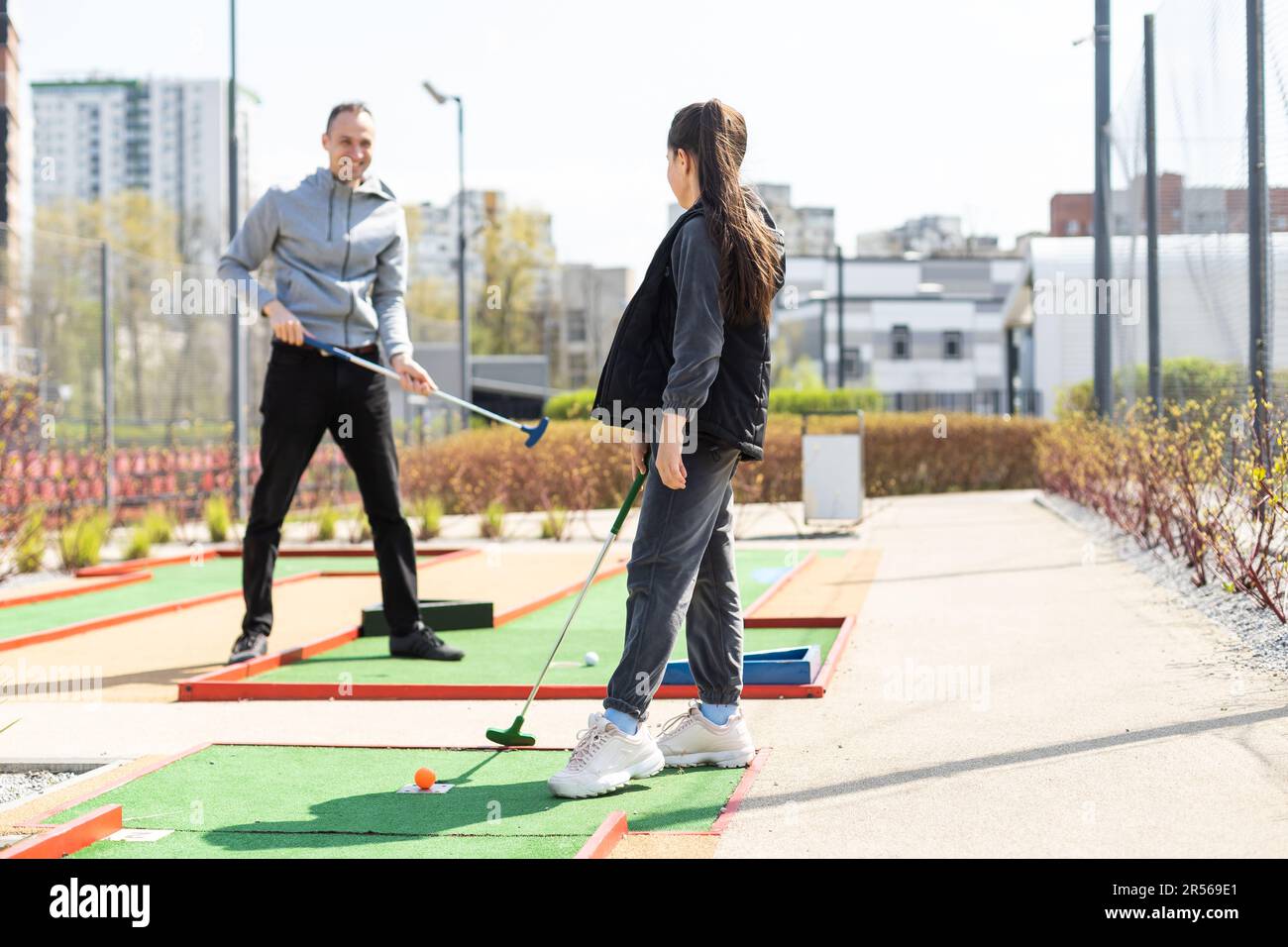 Mini-golf ball on artificial grass. Summer season game Stock Photo - Alamy