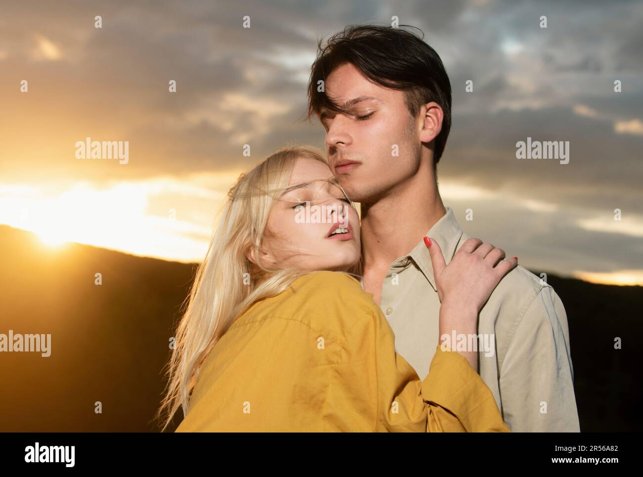 Tenderness couple touch. Young couple in love hug each other. Love ...