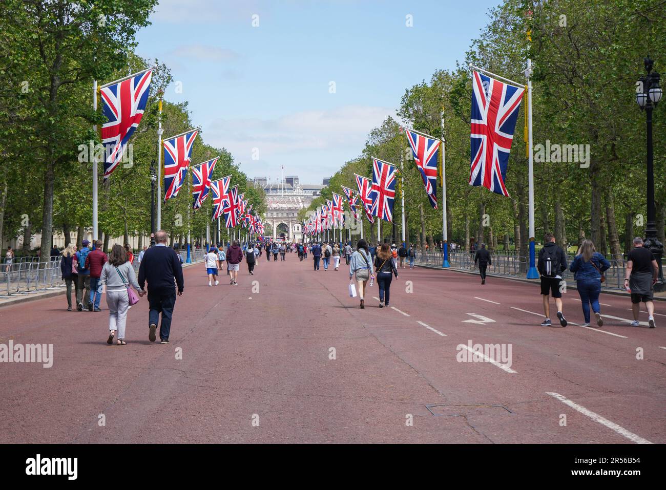 London UK. 1 June 2023 .People walking in the sunshine on The Mall ...