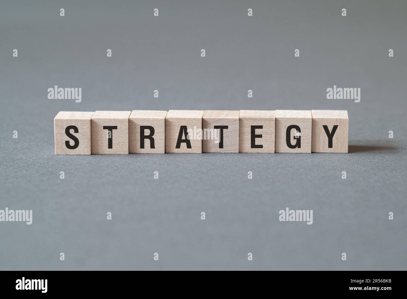 Strategy - word concept on building blocks, text Stock Photo - Alamy