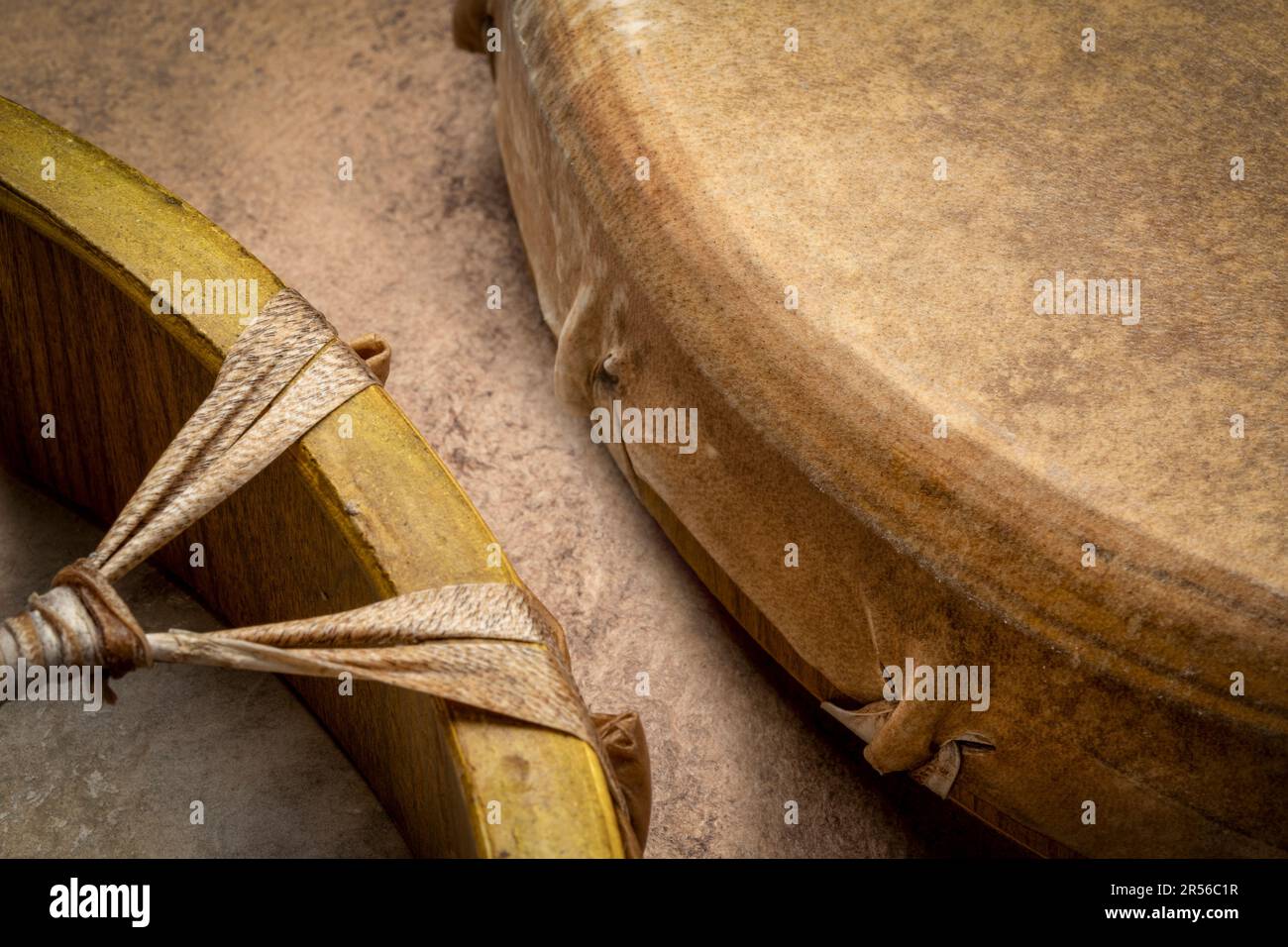 two handmade, native American style, shaman frame drums covered by goat ...