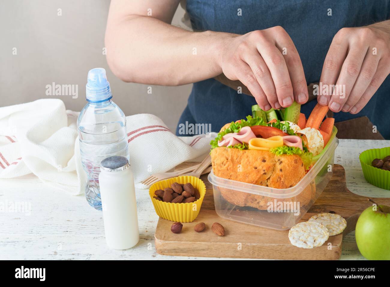 Healthy food for school lunch concept. Care father making school lunch ...