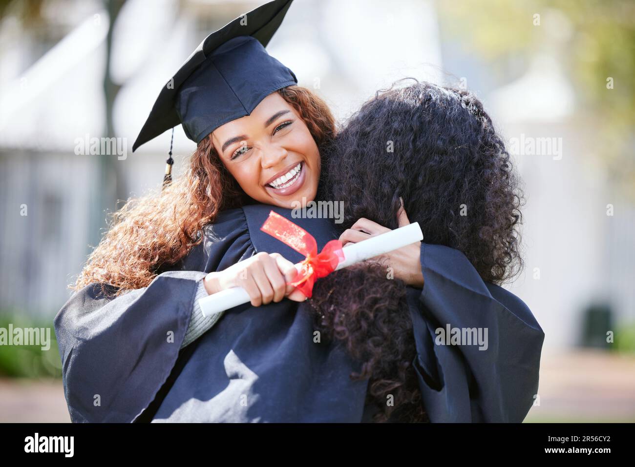 Women friends, hug and graduation certificate with smile, celebration ...
