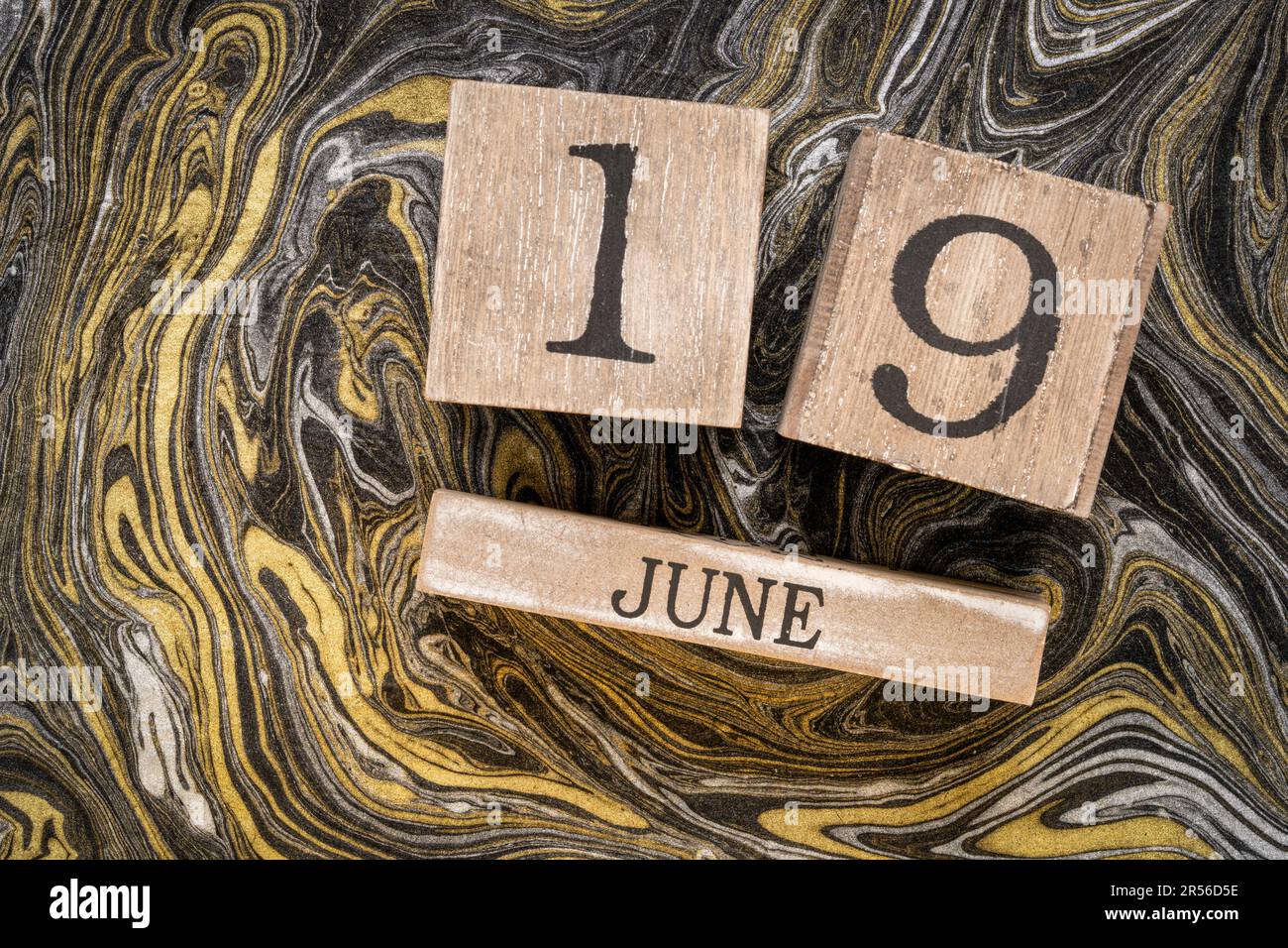 Juneteenth (June 19) in a desktop wooden calendar – also known as ...