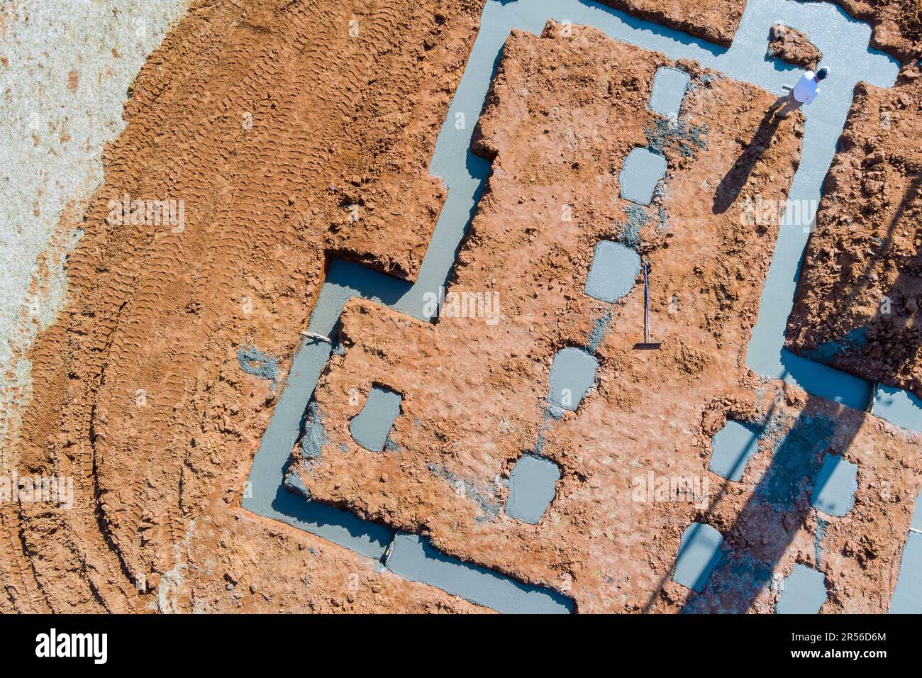 Process of pouring foundation involves excavating ground then pouring ...