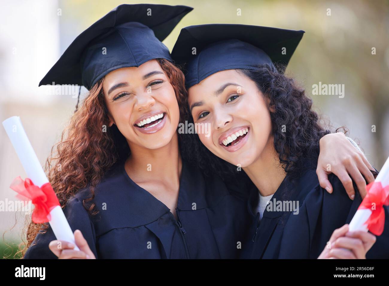 Graduation, hug and portrait of friends at college with diploma ...