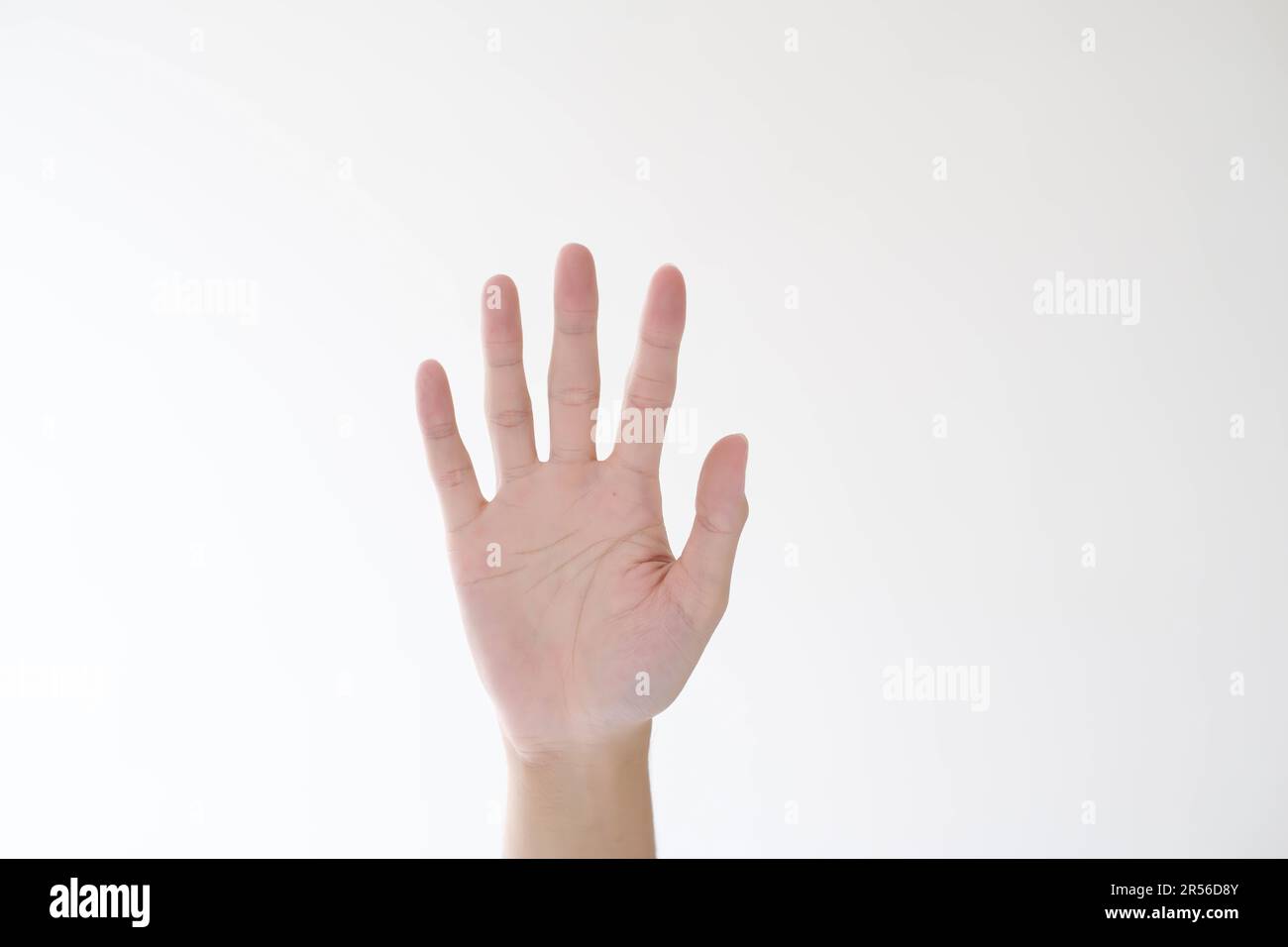 A man's hand with five fingers on an isolated white background Stock ...