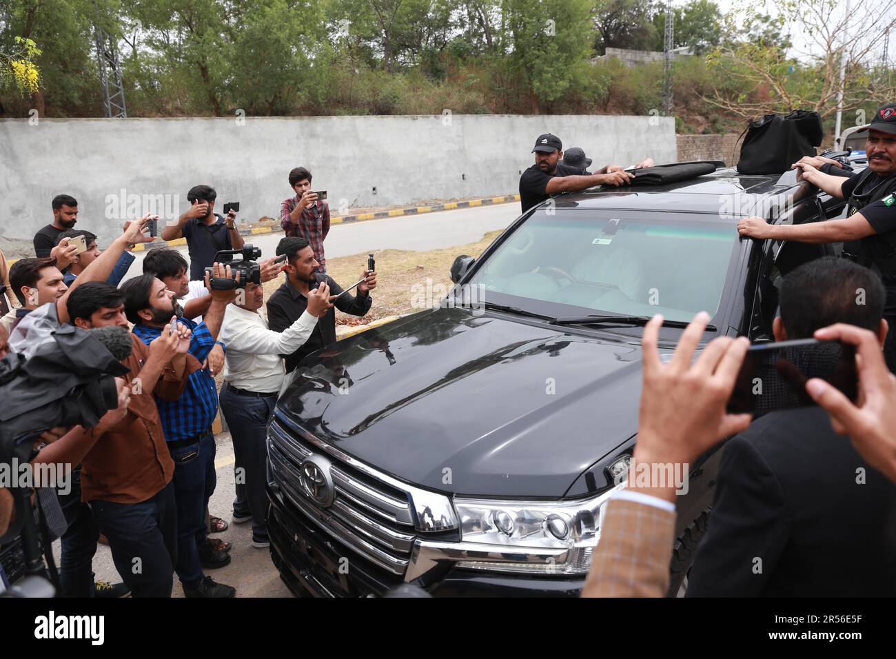 A vehicle carrying former Pakistan's Prime Minister Imran Khan leaves from Islamabad High court ...