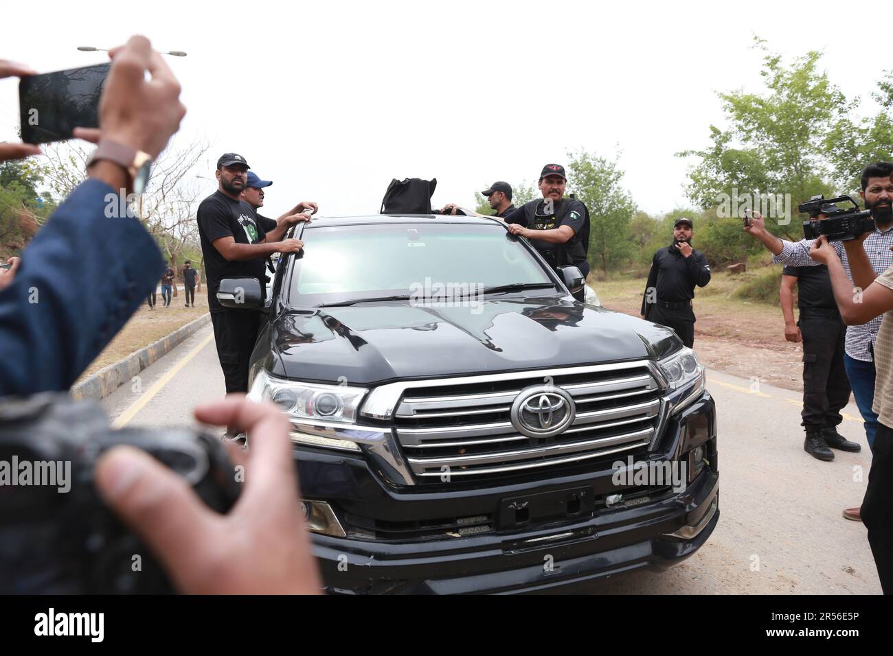 A vehicle carrying former Pakistan's Prime Minister Imran Khan leaves ...