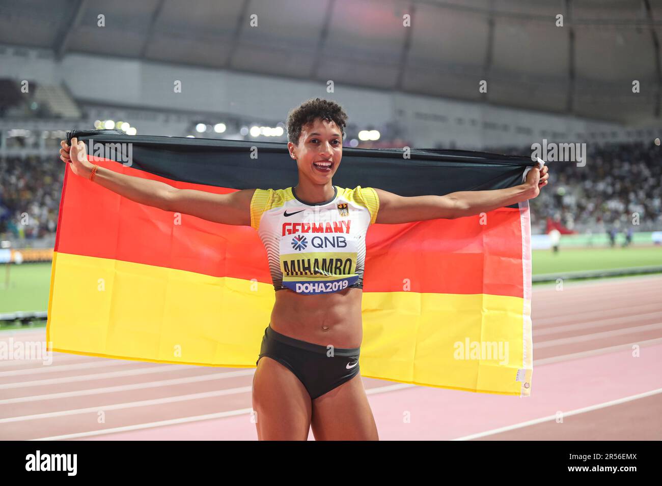 Malaika MIHAMBO celebrating with her country's flag in the long jump at ...