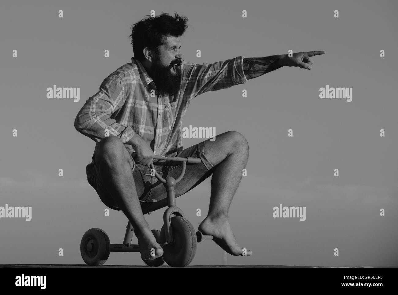 Smiling man on bike Black and White Stock Photos & Images - Alamy
