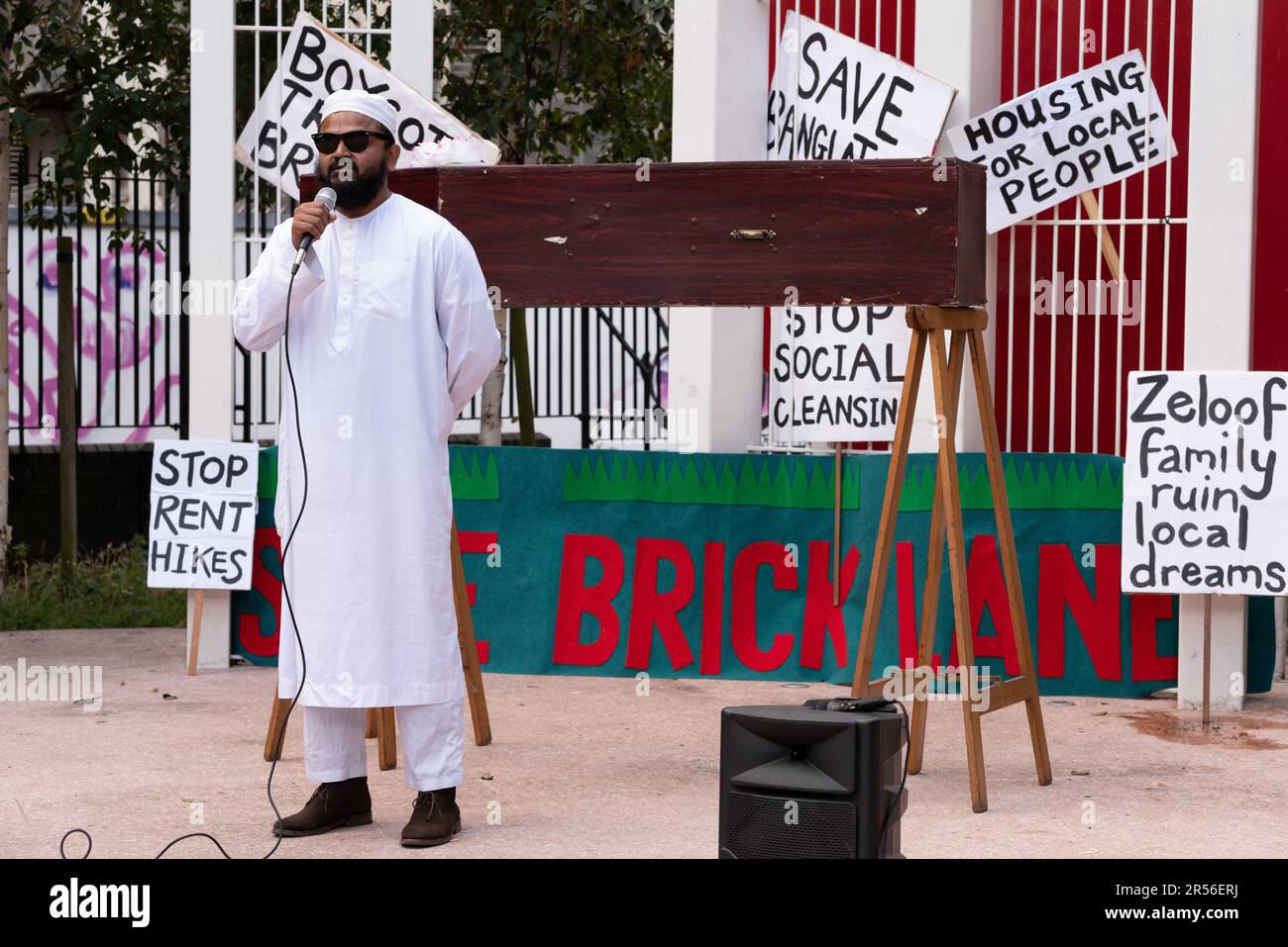 A community activist addresses a rally in Altab Ali Park against plans ...