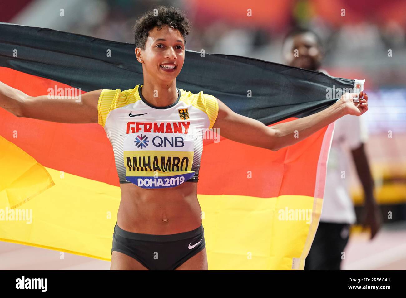 Malaika MIHAMBO celebrating with her country's flag in the long jump at ...