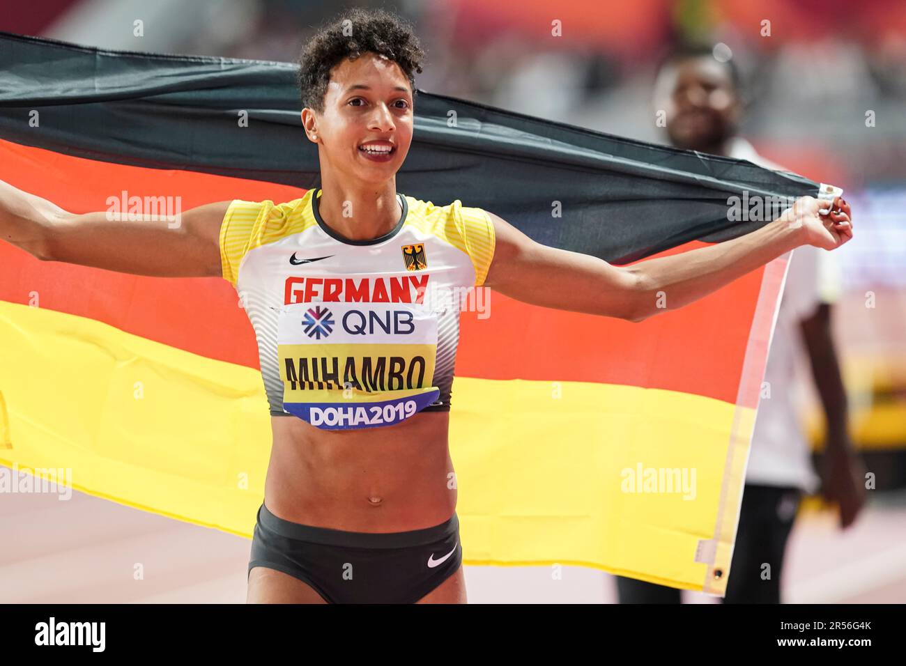 Malaika MIHAMBO celebrating with her country's flag in the long jump at ...