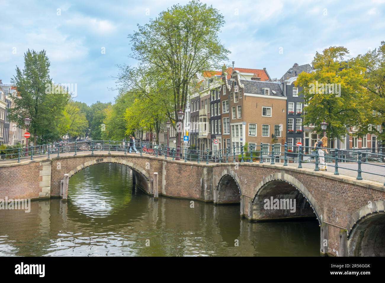 Netherlands. Old stone bridges on the Amsterdam canals. Typical Dutch ...