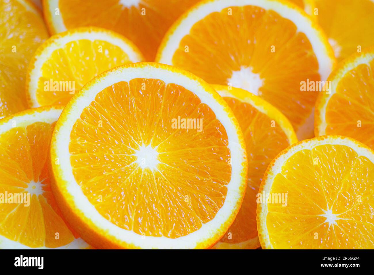 Round slices of fresh juicy oranges close-up. Bright fruity background ...
