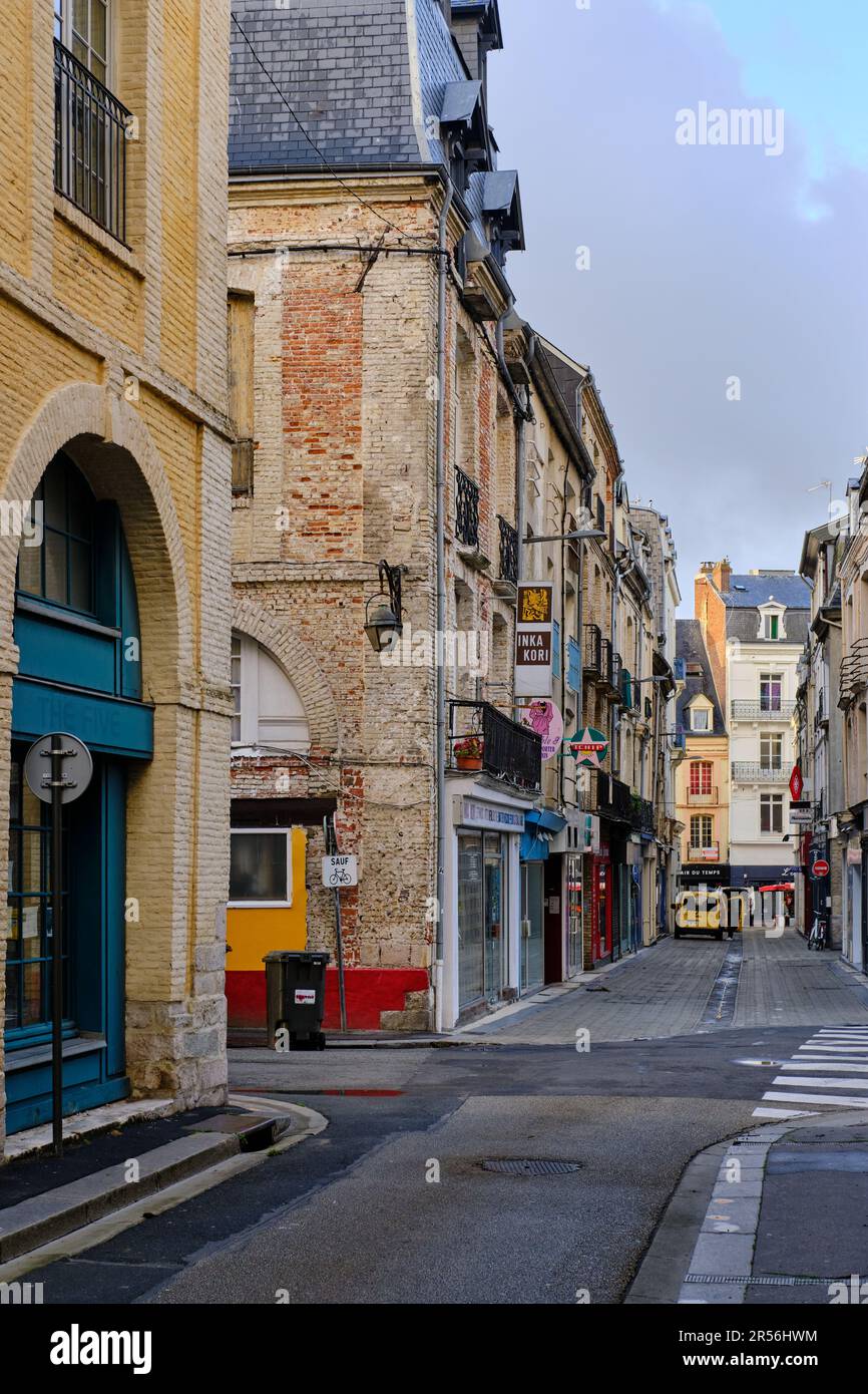 Dieppe, Normandy, France - June 24 2022: Rue de la Moriniere narrow street lined with shops. No ...