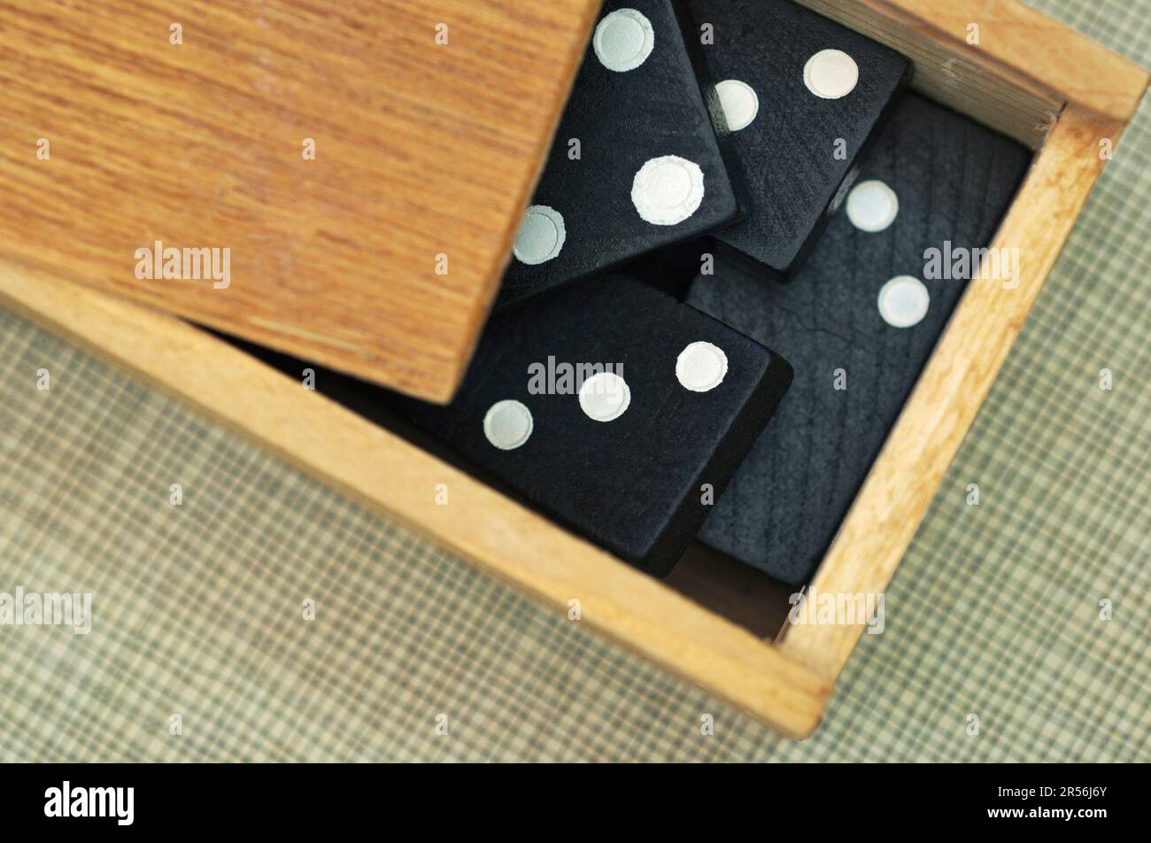 dominoes in wooden box Stock Photo - Alamy