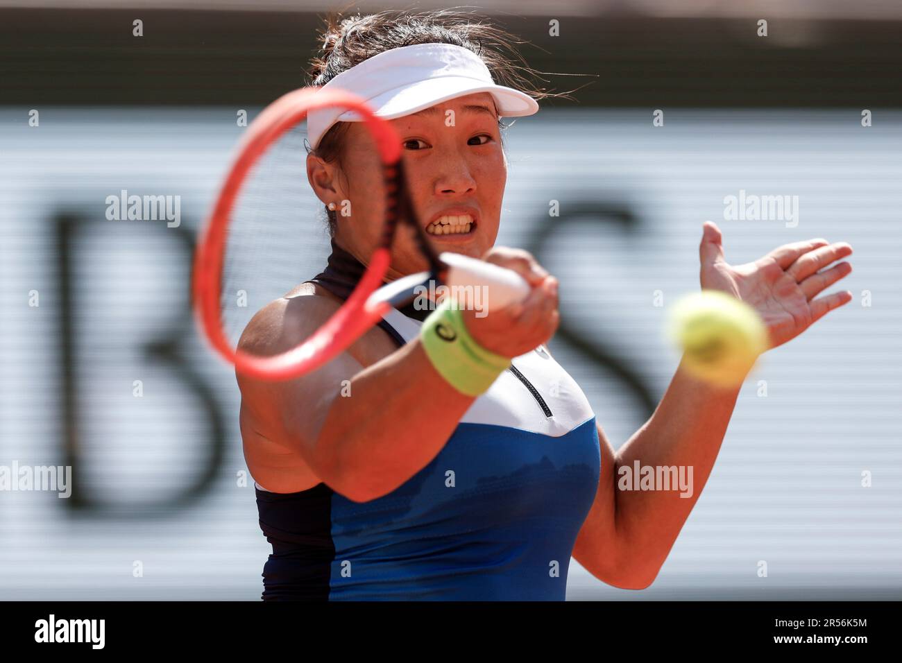 Claire Liu of the U.S. plays a shot against Poland's Iga Swiatek during ...