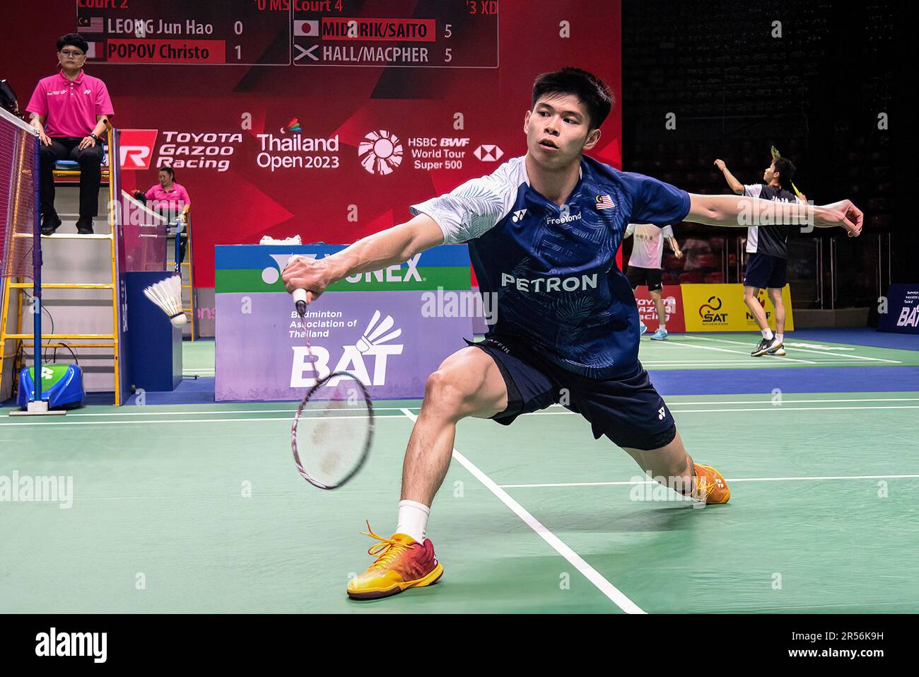 Leong Jun Hao of Malaysia plays against Christo Popov of France during ...