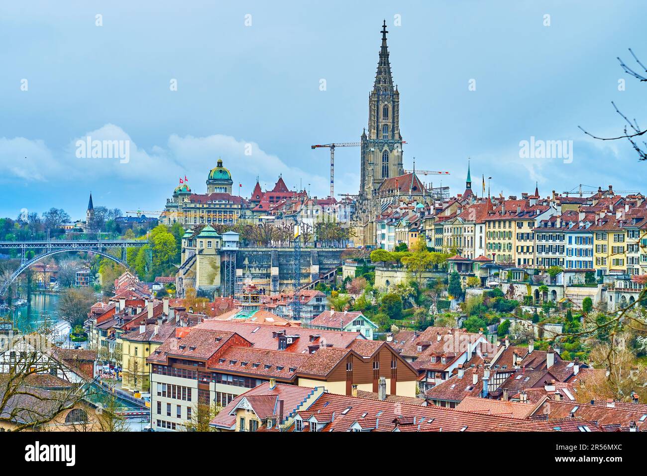 High bell tower of Cathedral dominates over medieval Bern's cityscape ...