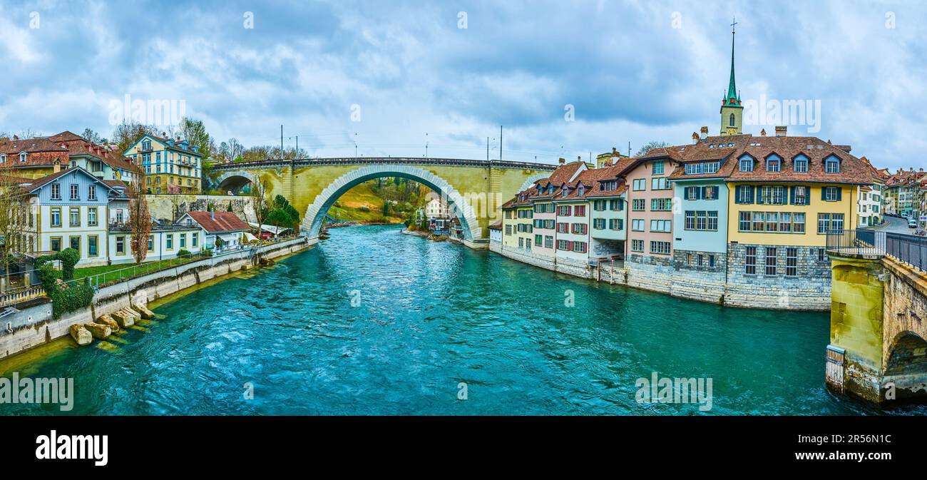The riverside houses and Nydeggbrucke bridge in Bern, Switzerland Stock ...