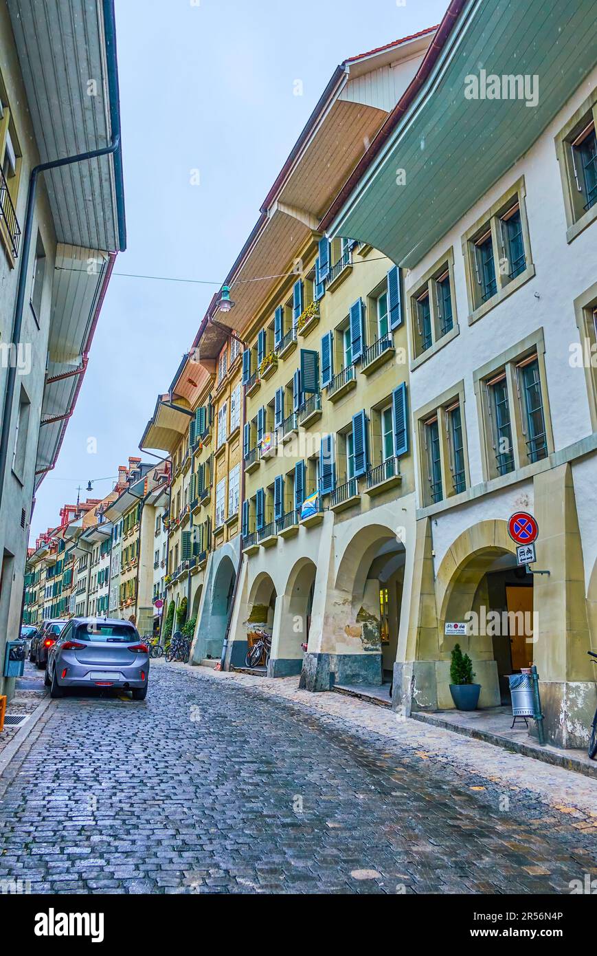 Scenic Bernese stone buildings with arcades on Postgasse street ...
