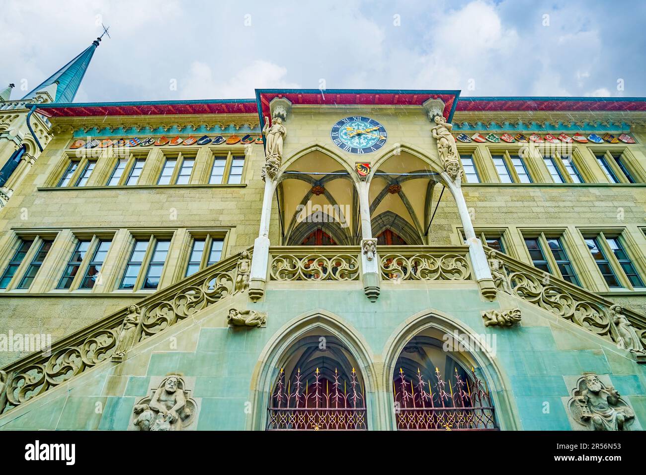 The main entrance loggia with clock, richly decorated in late Gothic ...