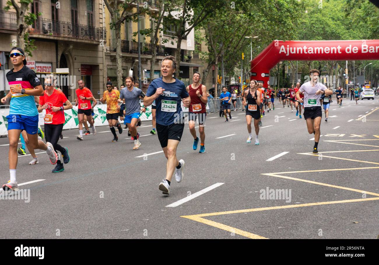 Runners at the finish line in a Barcelona marathon in early May ...