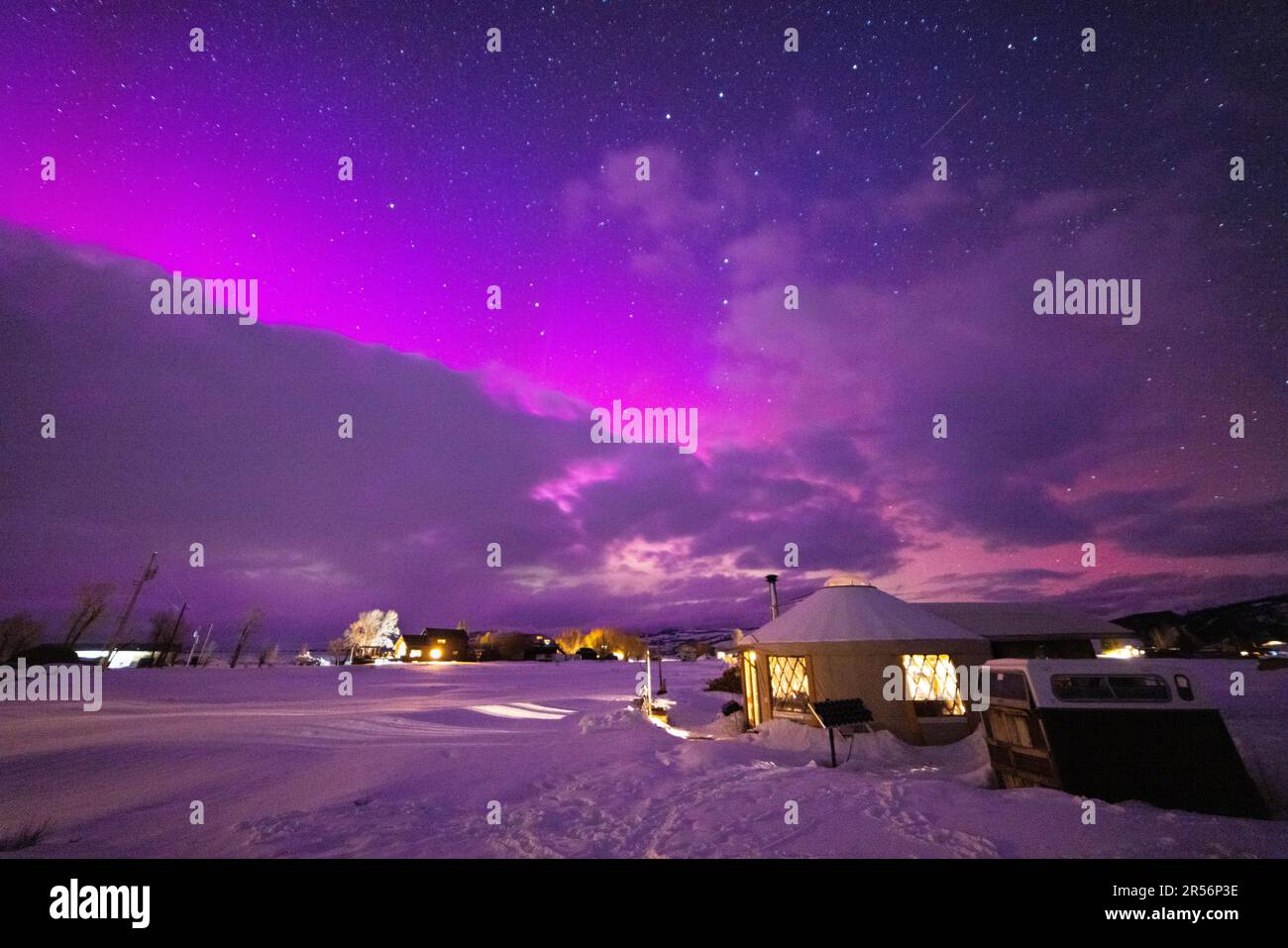 The northern lights glowing over a yurt in the Kelly Yurt Park. Grand ...