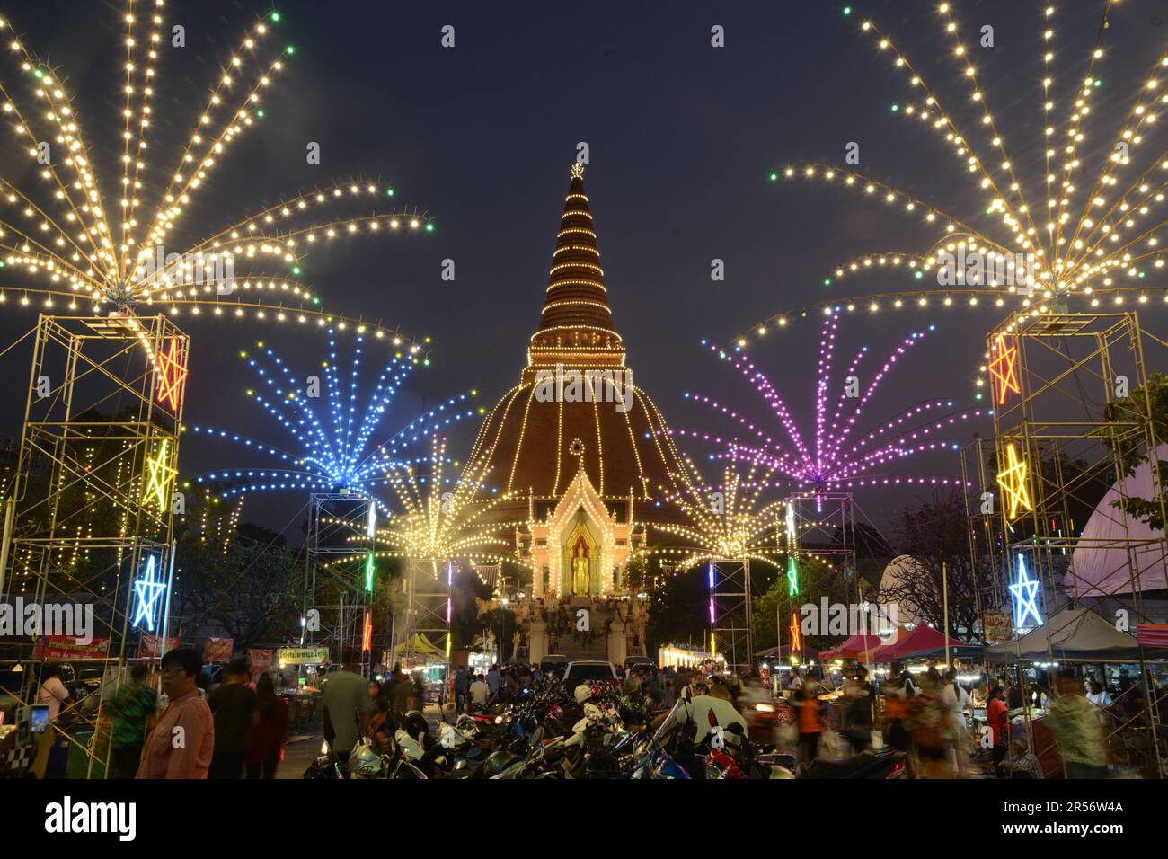 Colorful night lights at Wat Phra Pathom Chedi temple. The largest ...