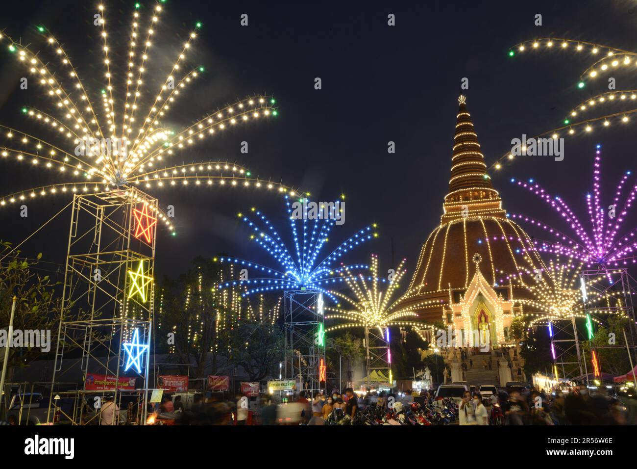 Colorful night lights at Wat Phra Pathom Chedi temple. The largest ...