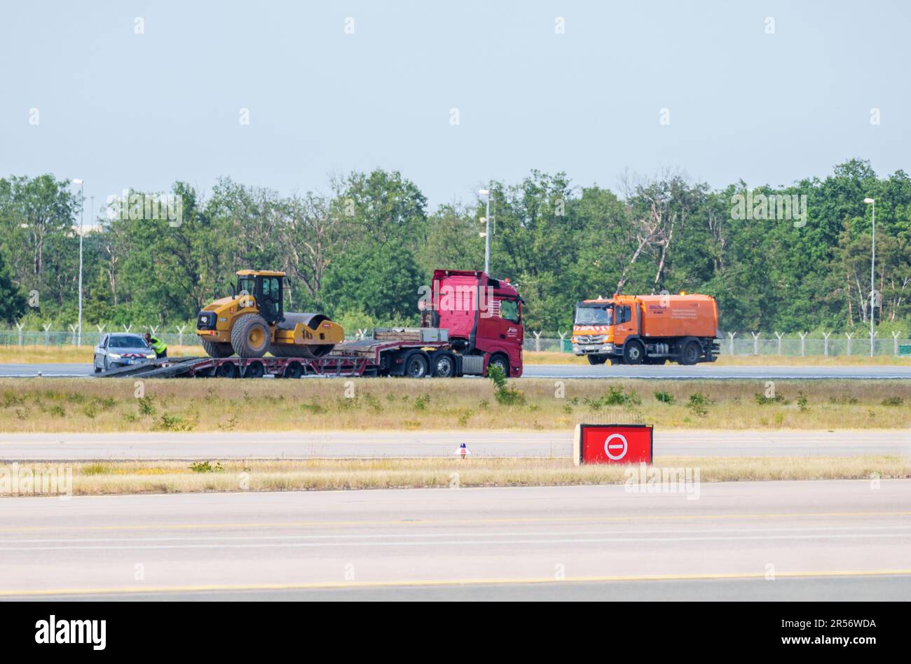 01 June 2023, Hesse, Frankfurt/Main: Construction vehicle driving on the Norwest runway at the ...