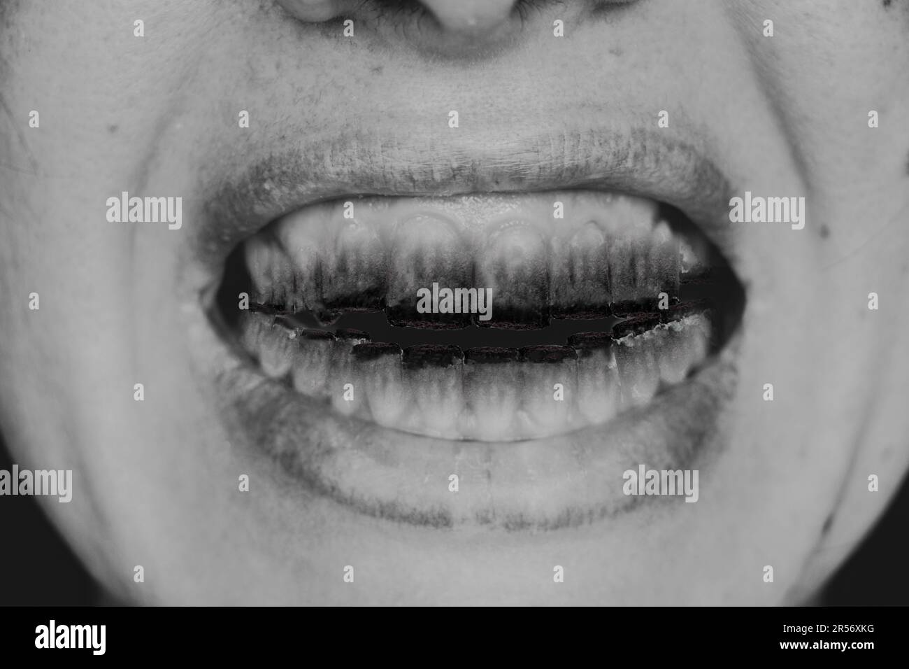 Open mouth of a girl with a lit cigarette instead of teeth black and ...