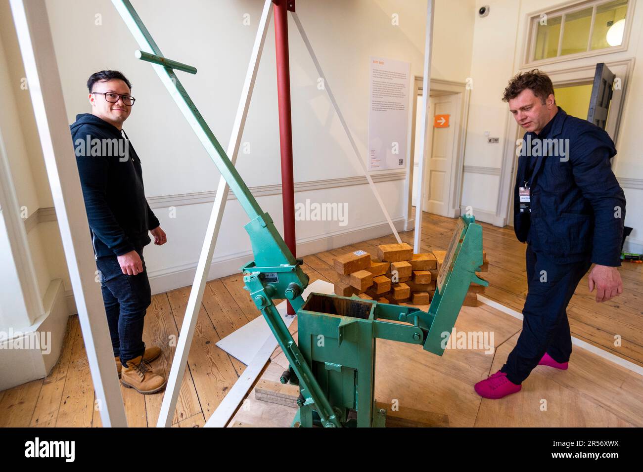 London, UK. 1 June 2023. Architects from Hassell with a Kenyan brick ...