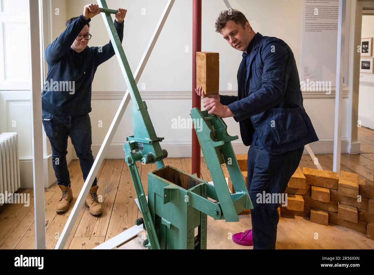 London, UK. 1 June 2023. Architects from Hassell with a Kenyan brick ...
