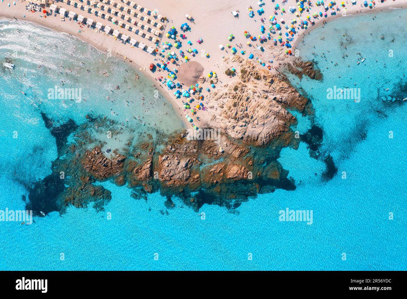 Aerial view of beautiful beach with white sand, umbrellas, sea Stock ...