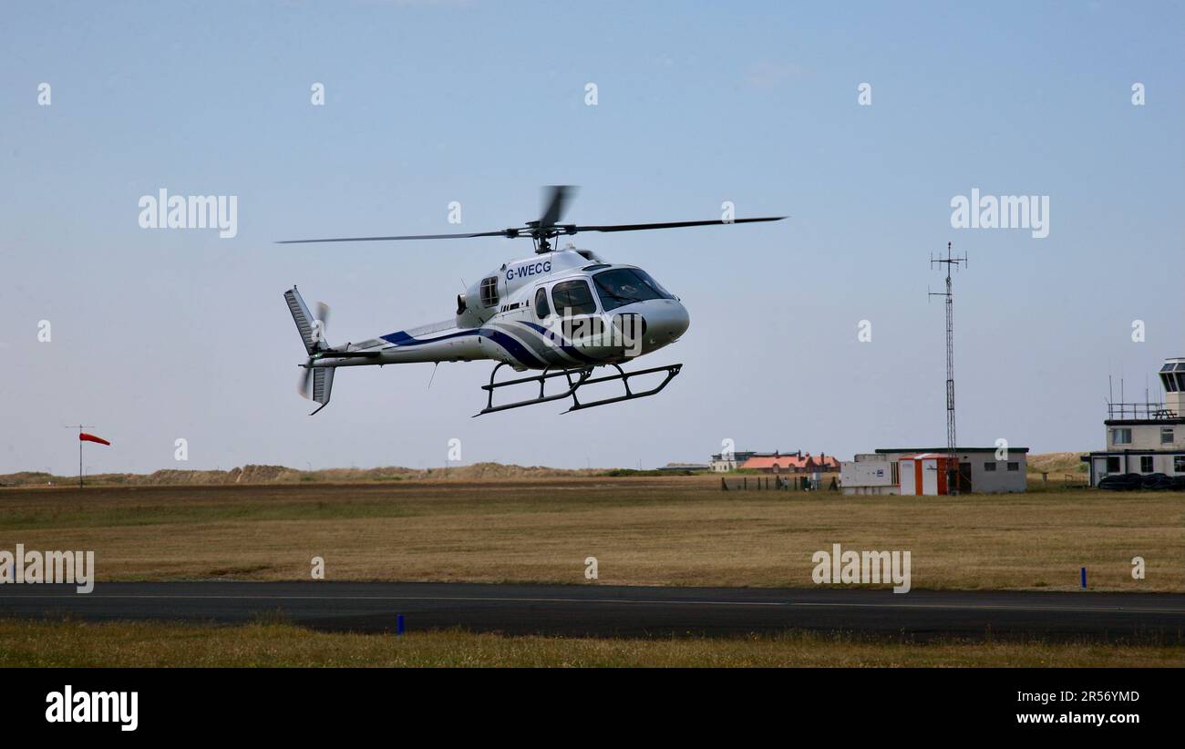 A close up view of helicopter G-WECG, a Eurocopter, owned by Airbus ...