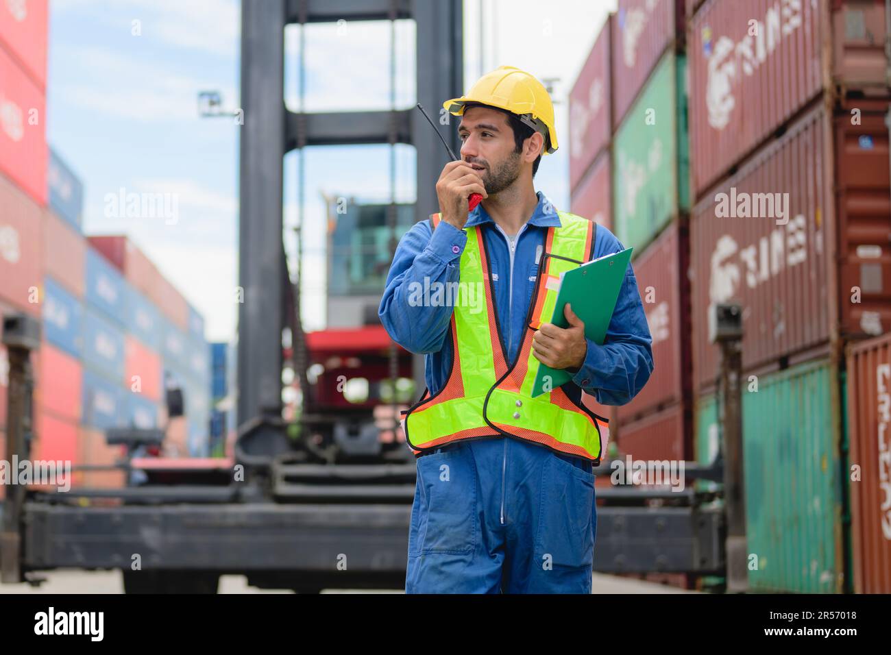 Warehouse engineer worker working at industrial container yard Stock ...