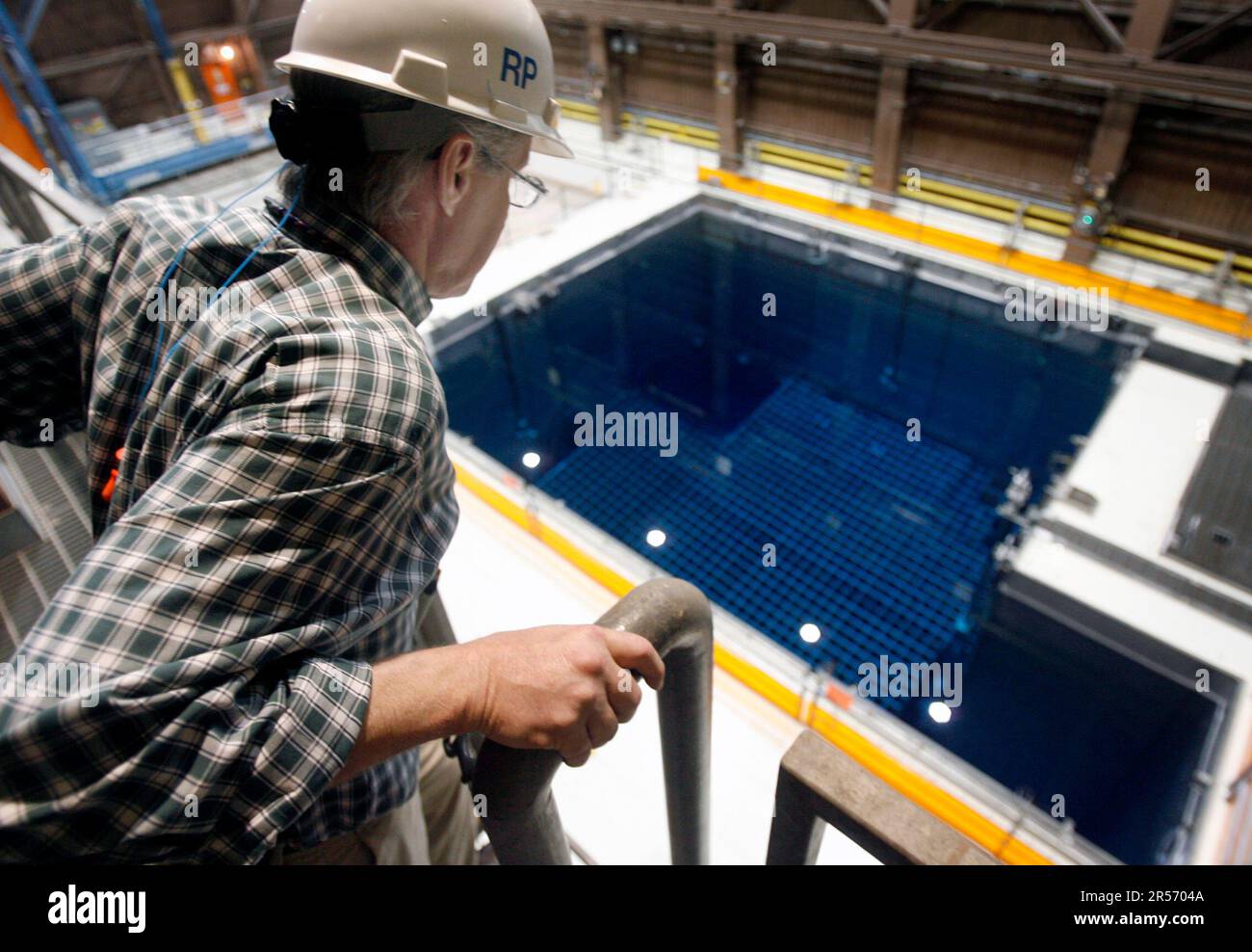 Radiation protection physicist Mark Somerville gets an overhead look at ...