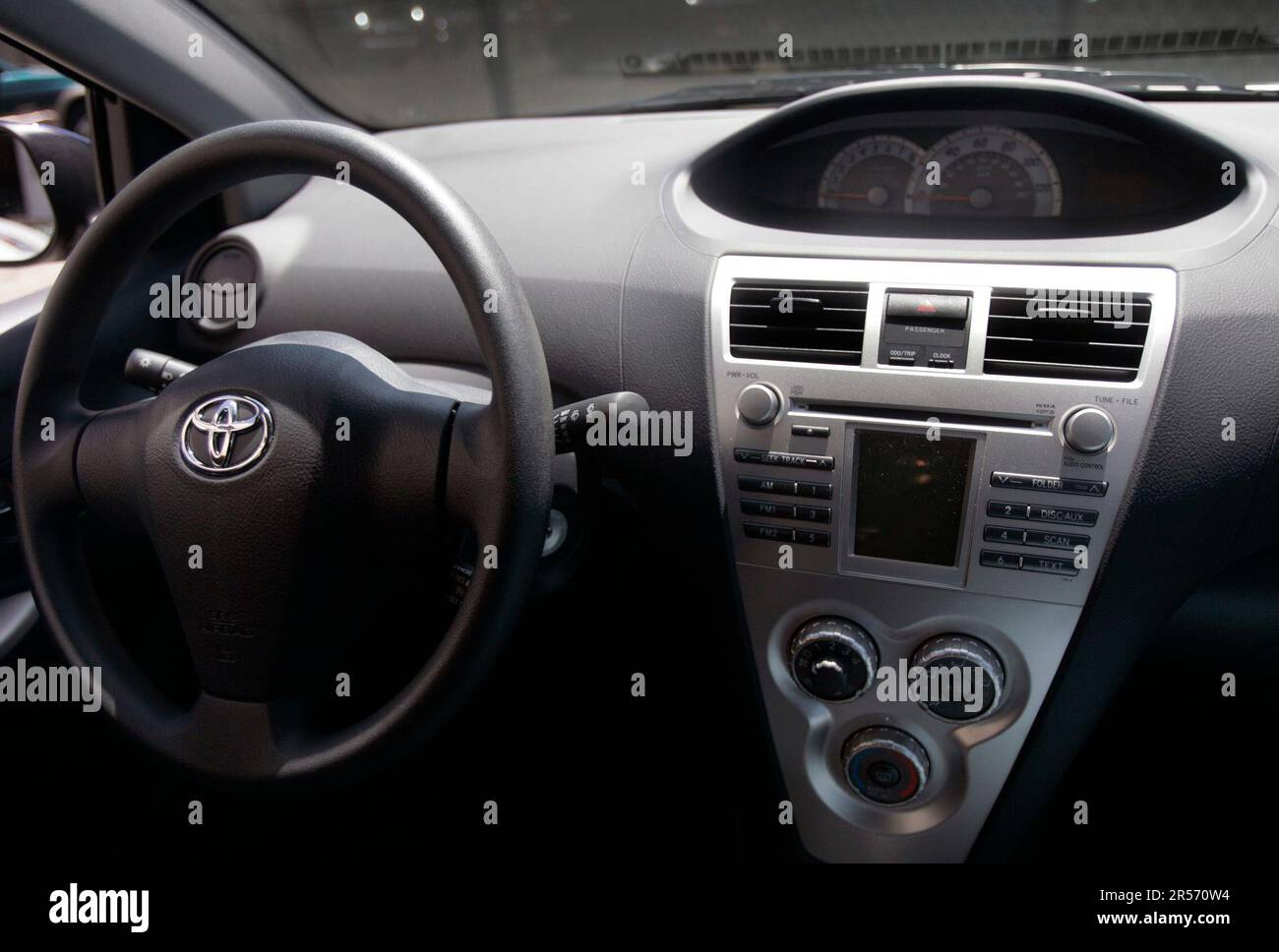 The instrument panel is displayed in the center of the dashboard. The ...