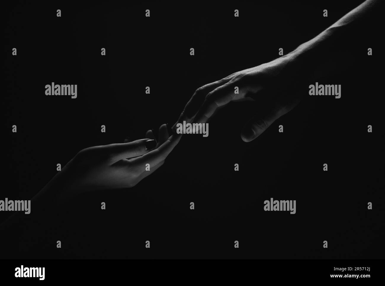 Hands gesturing on black background. Giving a helping hand. Support and ...