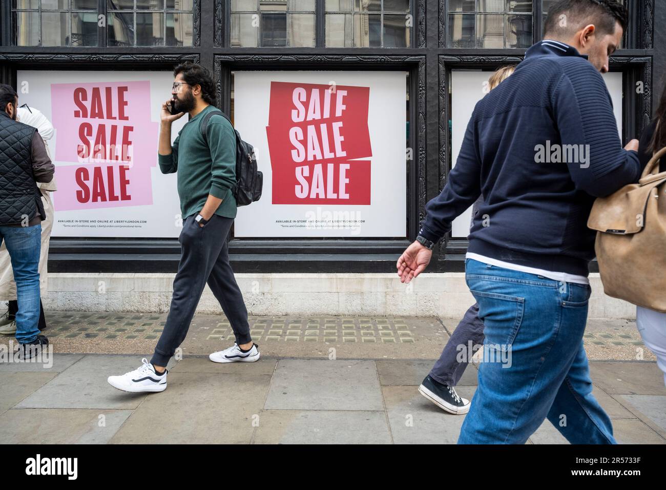 London, UK. 1 June 2023. People pass the windows of Liberty department ...