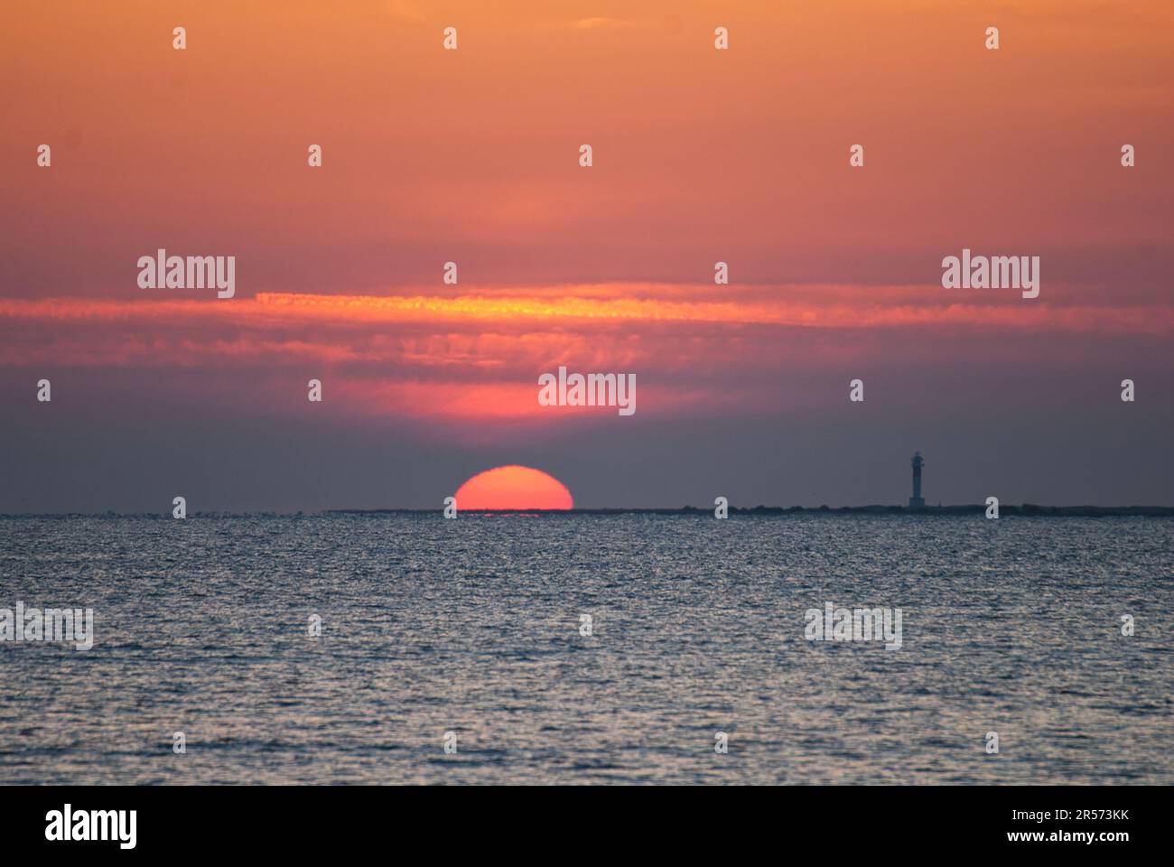 Sunrise next lighthouse in hi-res stock photography and images - Alamy